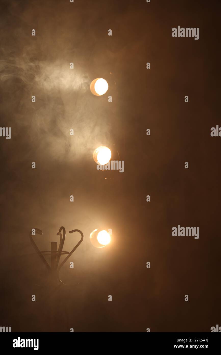 Professional spotlights and smoke on stage in theatre Stock Photo - Alamy