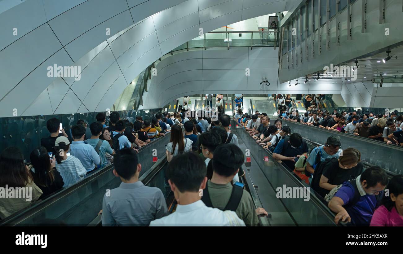 Hong Kong 2024 May 2: crowded of people inside the station of MTR. MTR ...