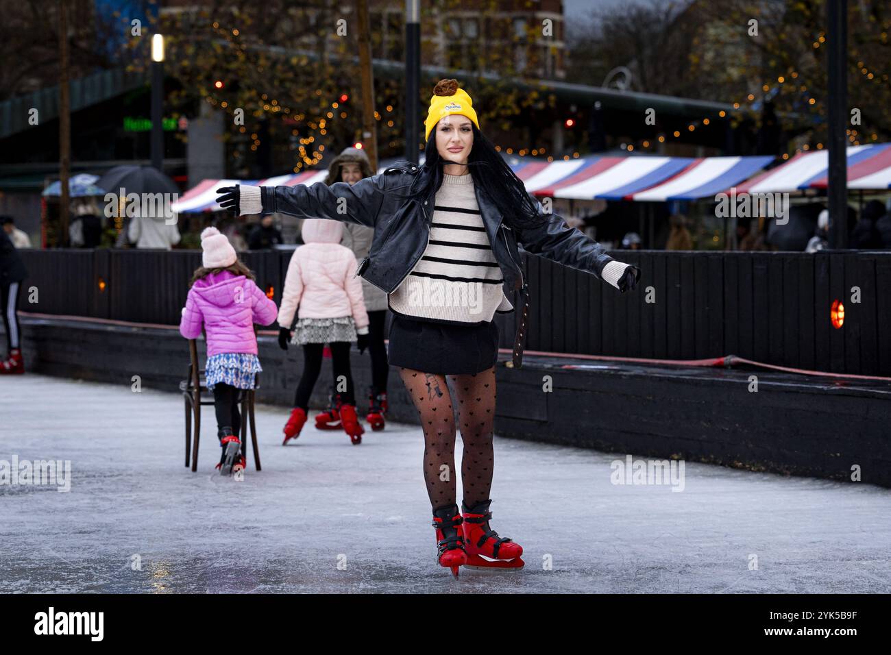AMSTERDAM - Skaters at the artificial ice rink on the Museumplein in ...