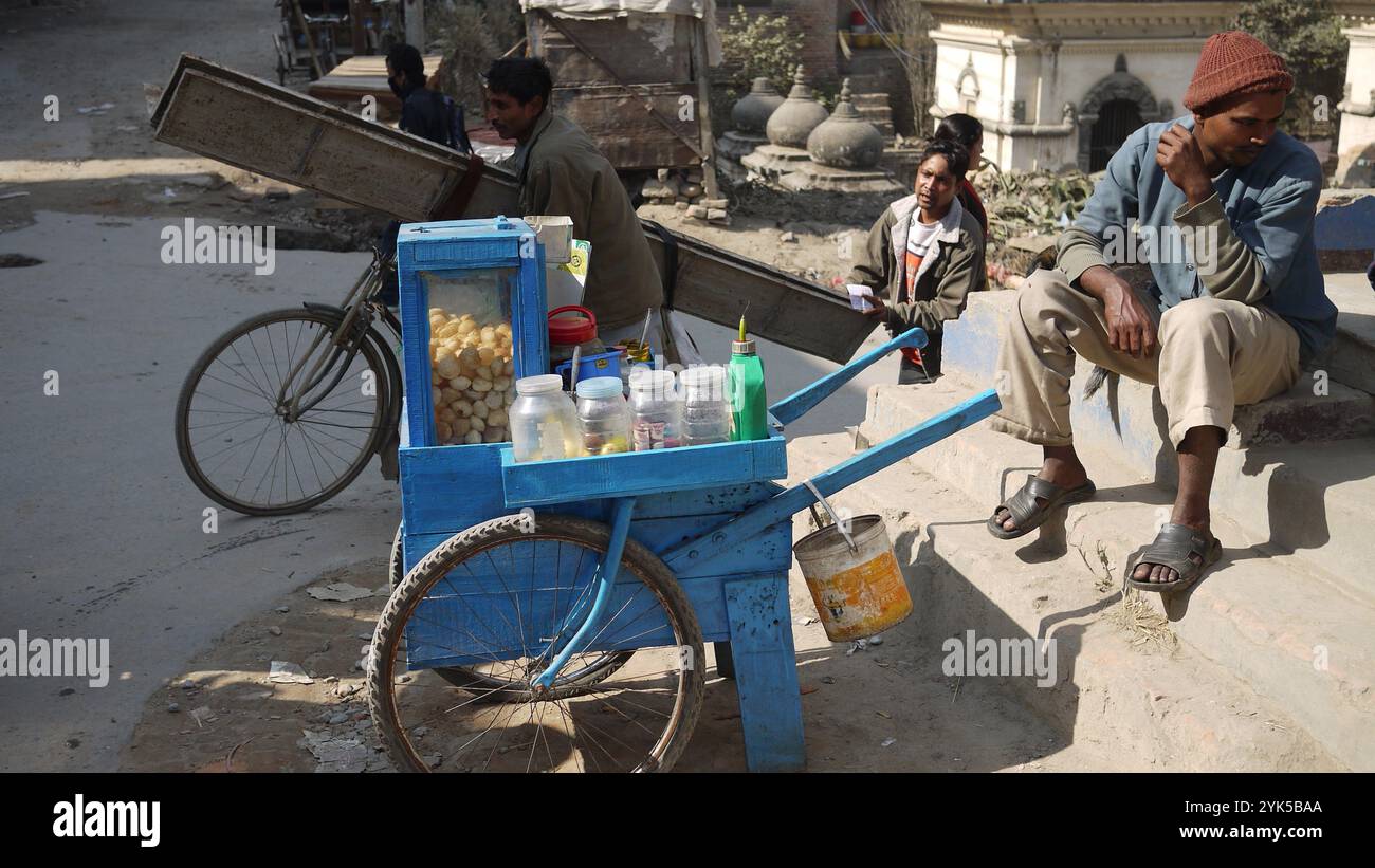 local hawker sell the street food by the food cart Stock Photo - Alamy