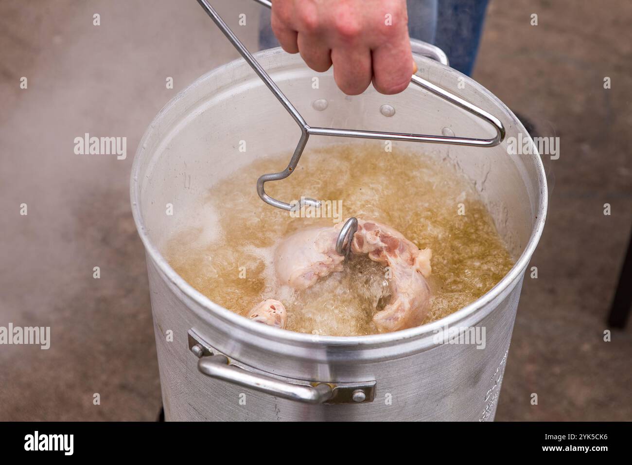 Deep Frying a Turkey Outdoors – Perfect for Thanksgiving Feasts Stock ...