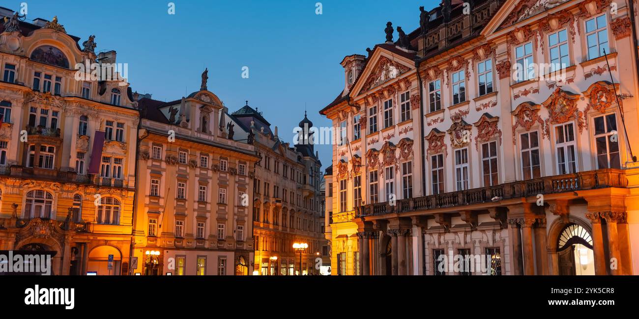 Architecturally beautiful buildings on Prague's City Square at dusk ...