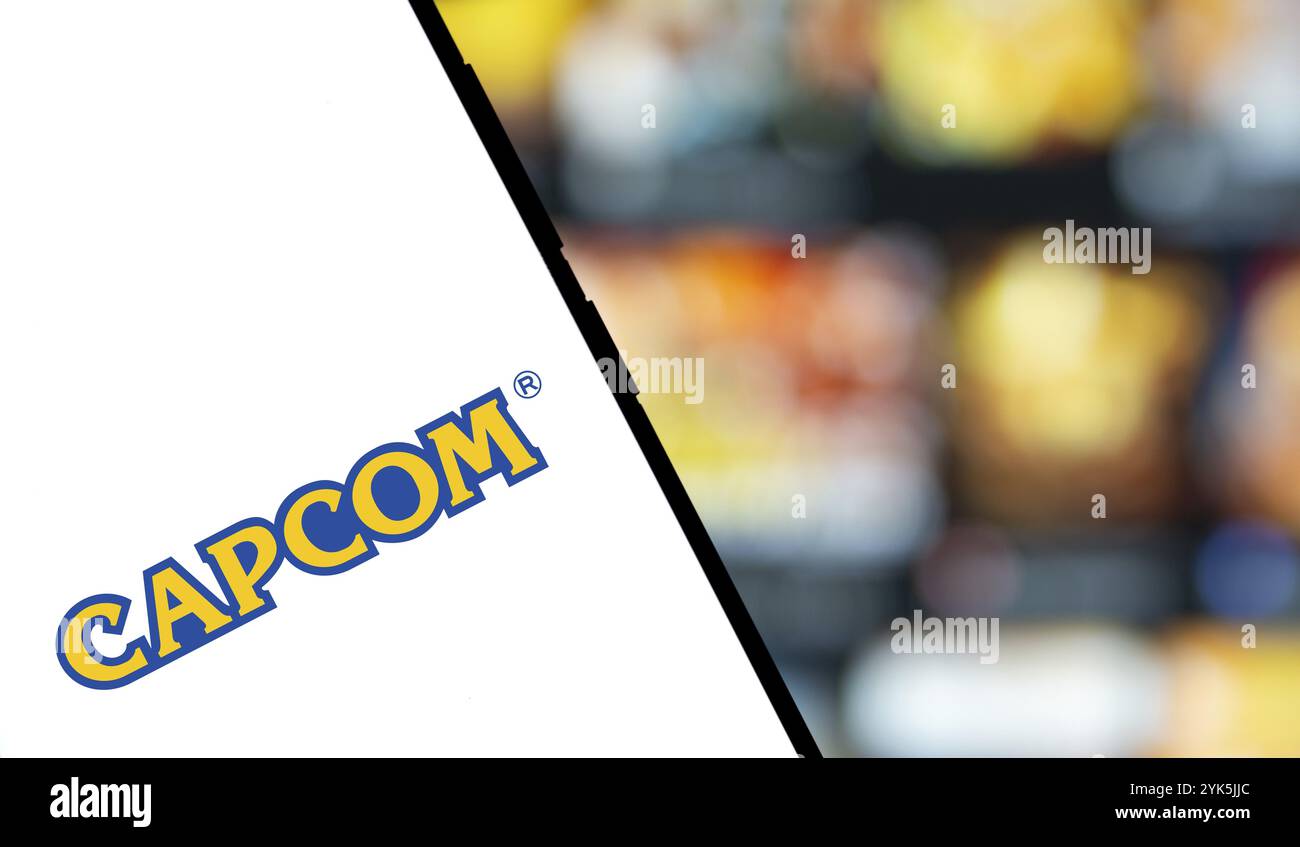 Capcom logo is displayed on smartphone.Capcom is a Japanese video game ...