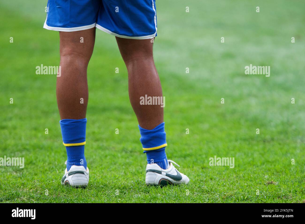 SHENYANG, CHINA - AUGUST 10: Ronaldinho's legs seen during team warm ...