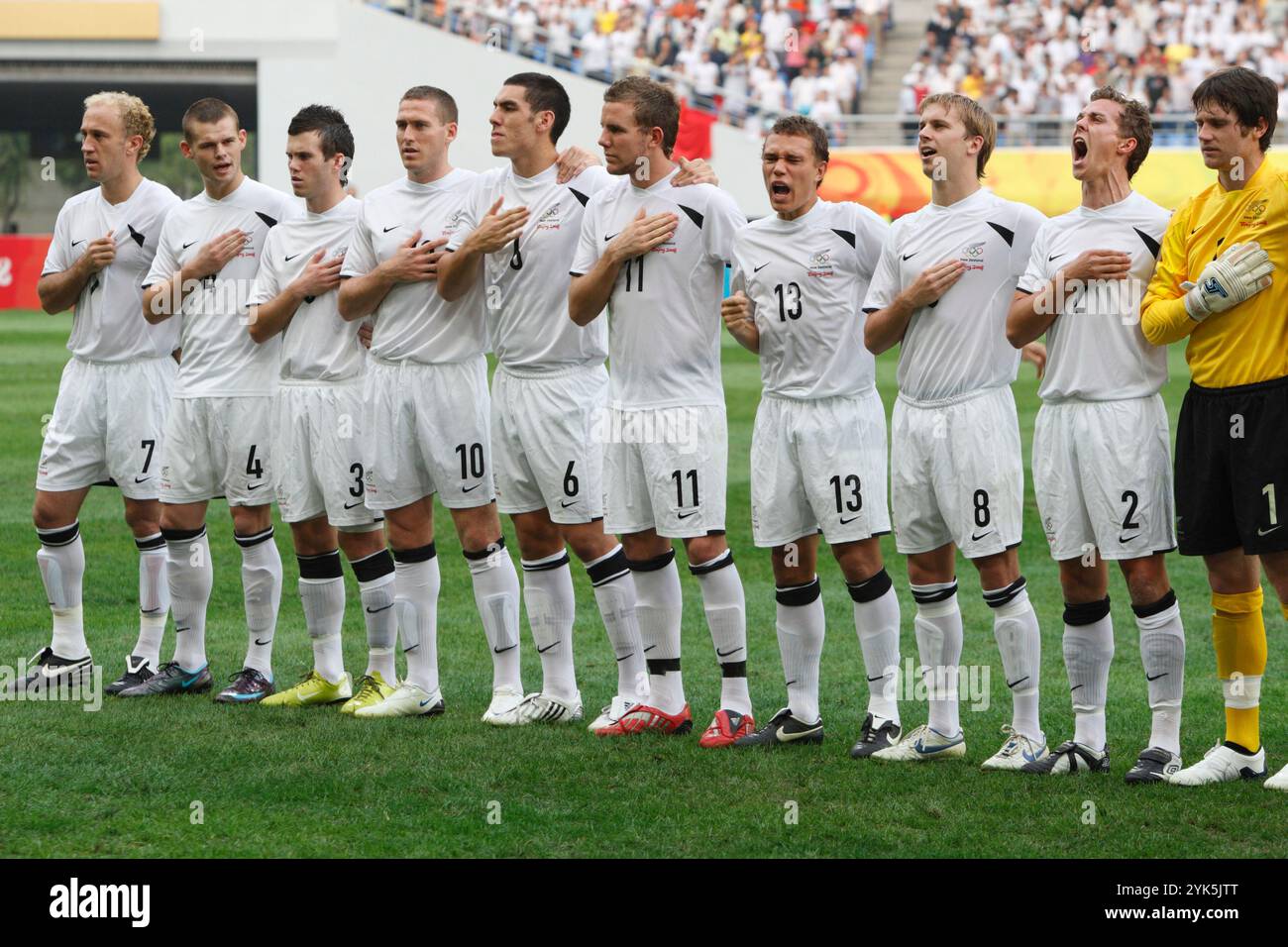 Footballers singing national anthem hi-res stock photography and images ...