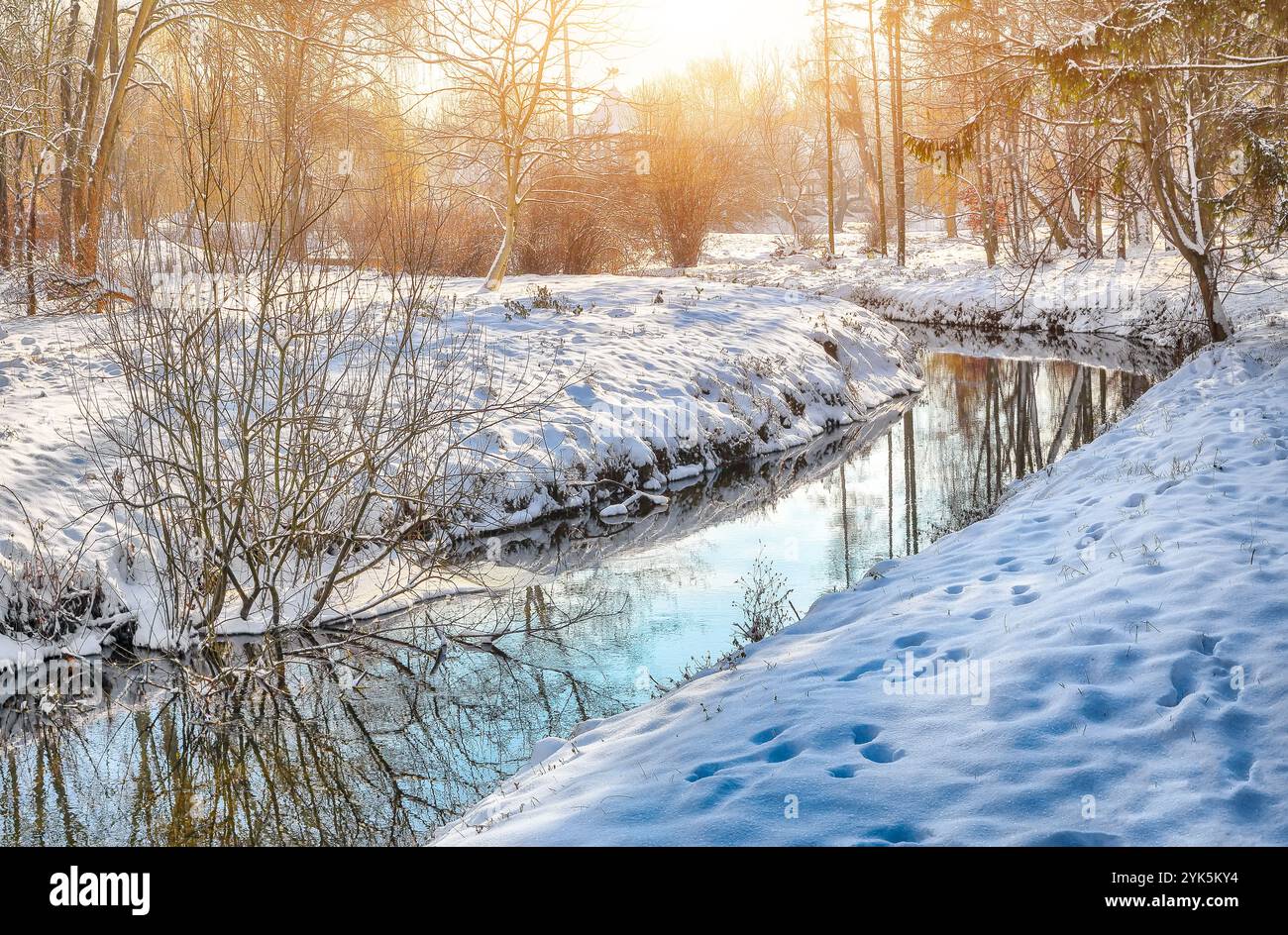 Colorful landscape with snowy trees, beautiful frozen river with ...