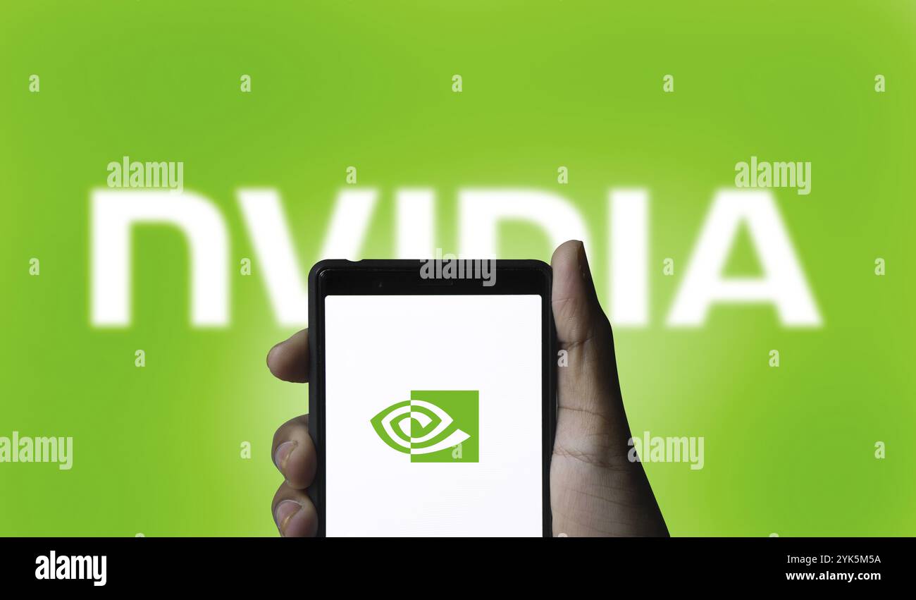Nvidia logo on smartphone screen with AI in the background. Nvidia ...