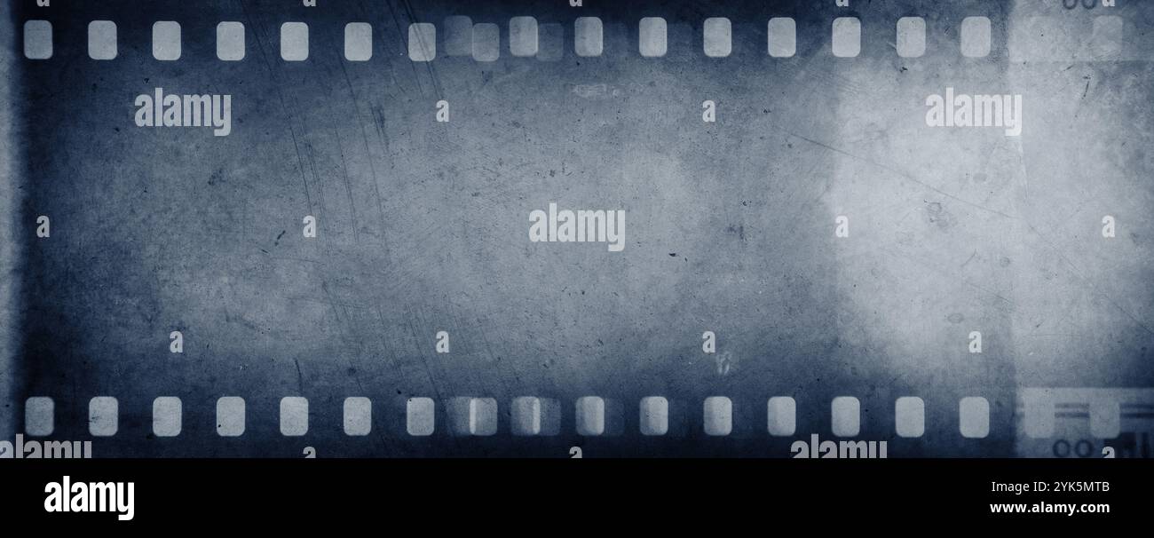 Film negatives frames blue background Stock Photo - Alamy