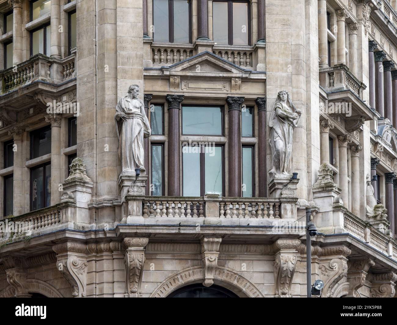 Detail of the historic decorative facade of a building with figures and ...
