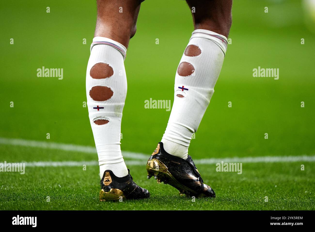 Close up of England's Jude Bellingham socks with holes in during the ...