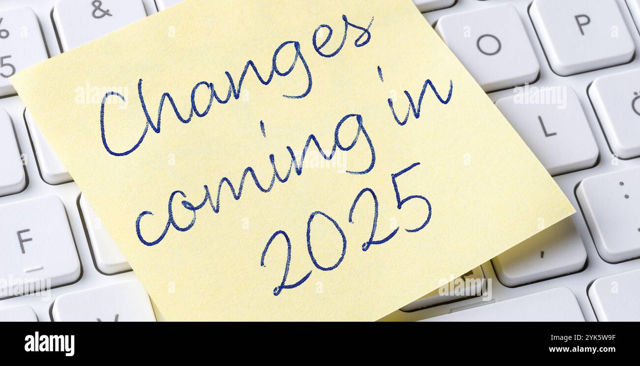 Sticky note on a keyboard - Changes coming in 2025 Stock Photo - Alamy