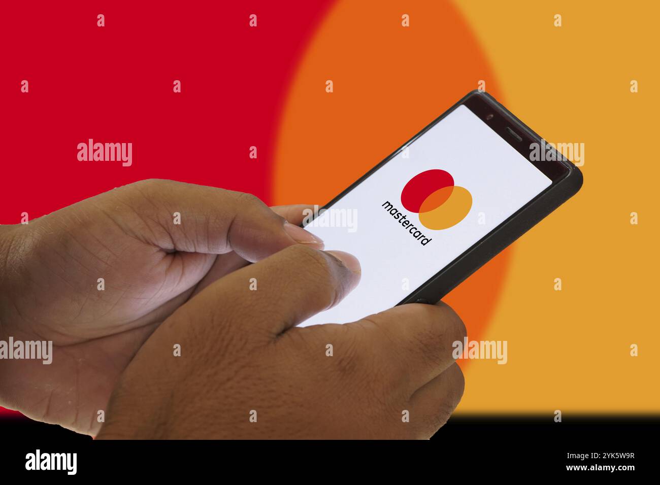 Smart phone with the Mastercard logo that is a brand of credit and ...