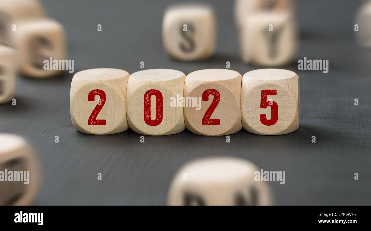 Letter dice with the number 2025 Stock Photo - Alamy