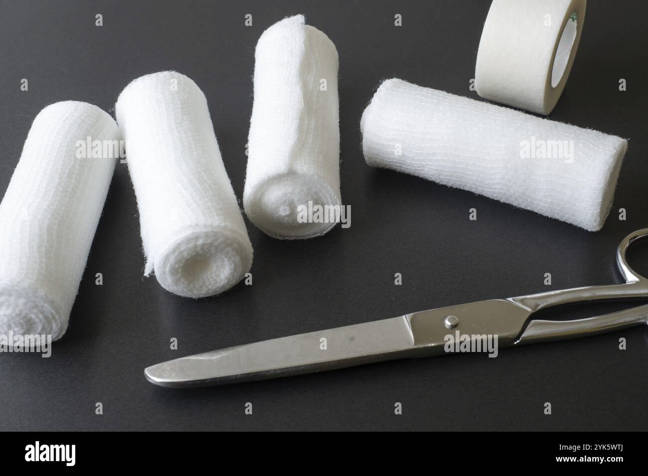 Medical bandages with scissors and sticking plaster. Medical equipment ...