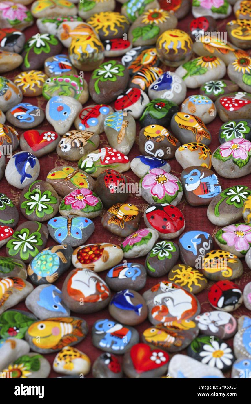 Color images on the stones, symbols, characters and animals Stock Photo ...