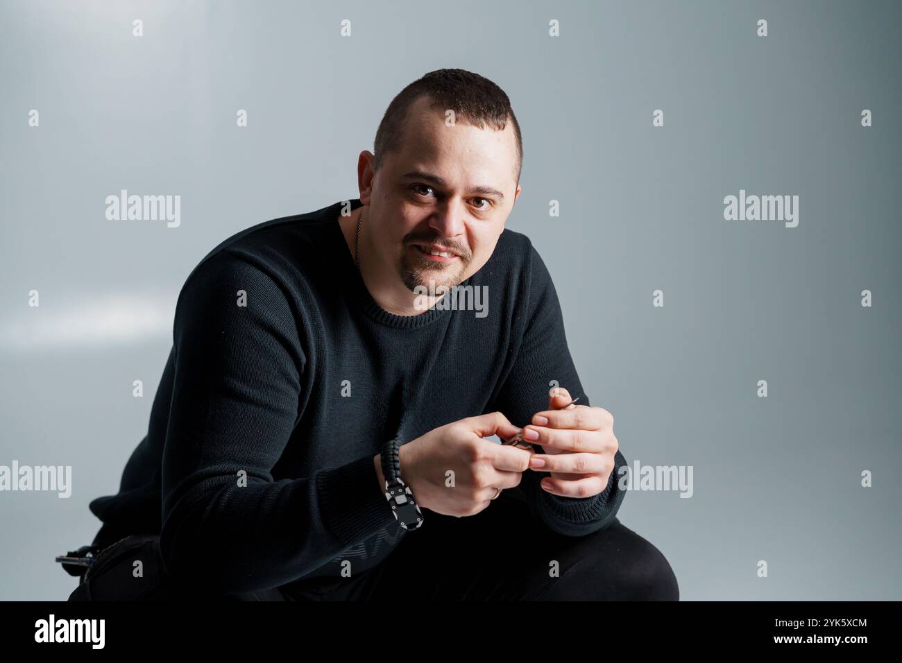 A Confident Man Engaged in Thoughtful Reflection Stock Photo - Alamy