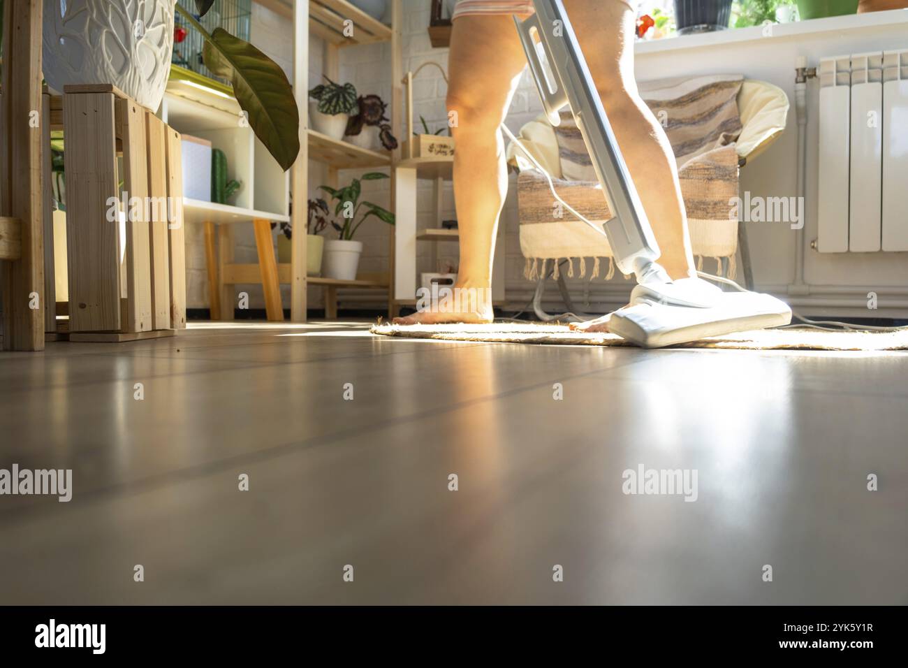 Housewife cleans carpet vacuum cleaners hi-res stock photography and ...