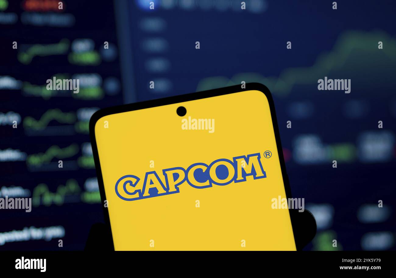 Capcom logo is displayed on smartphone.Capcom is a Japanese video game ...