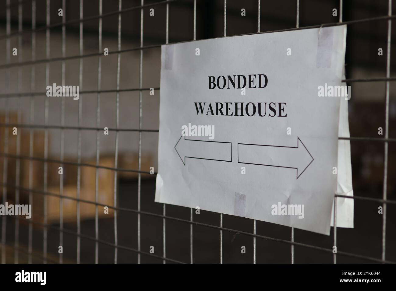Close-up of a white paper sign with BONDED WAREHOUSE text and double ...