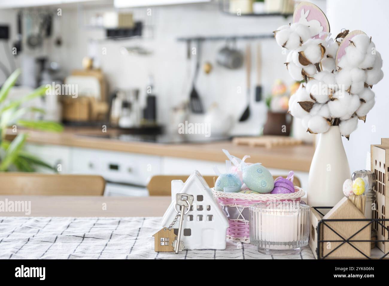 Key to house of cozy home with Easter decor with rabbit and eggs on ...