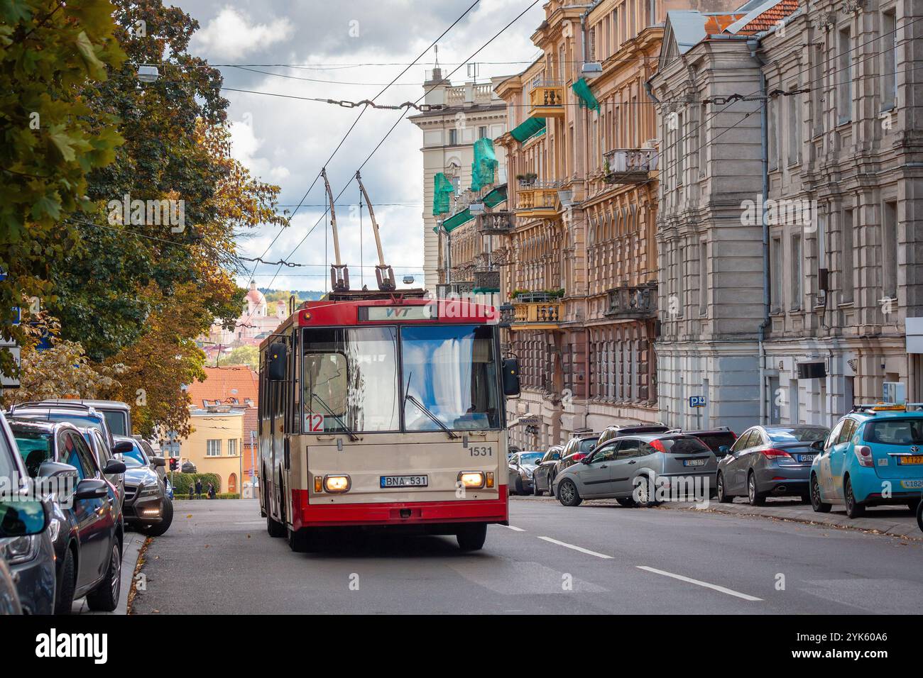 Lithuania, Vilnius - September 29, 2018 - An old beige-red trolleybus ...