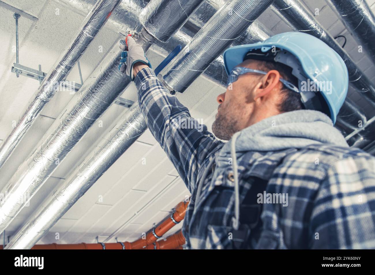 Installation of overhead equipment hi-res stock photography and images ...