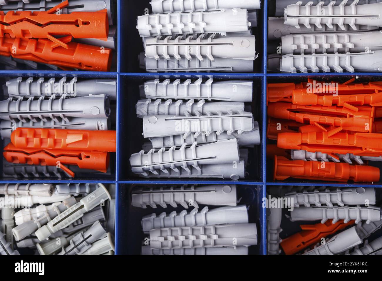 Set of dowels in the box Stock Photo - Alamy