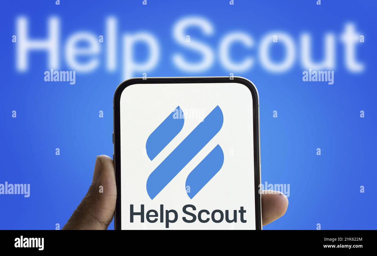 Help Scout logo is displayed on smartphone. Help Scout PBC is a global ...
