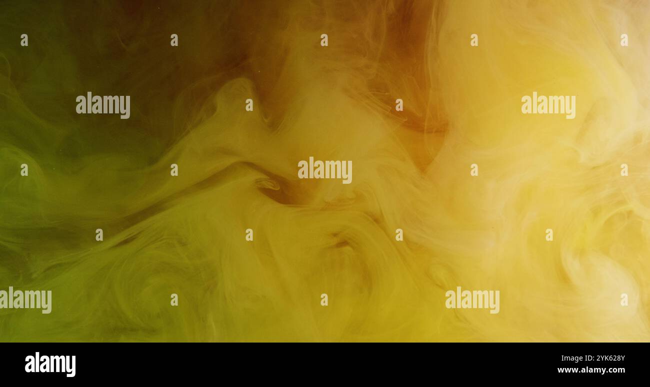Underwater ink. Vapor flow. Yellow green color splash mist floating ...