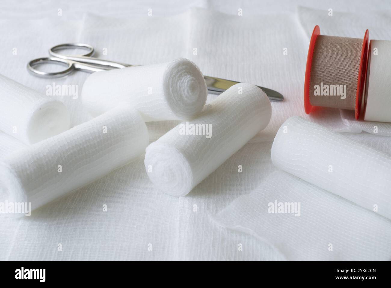 Medical bandages with scissors and sticking plaster. Medical equipment ...