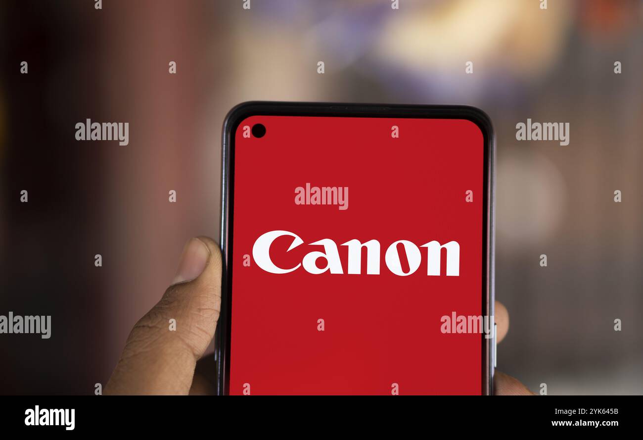 Canon logo is displayed on smartphone.Canon Inc is a Japanese ...