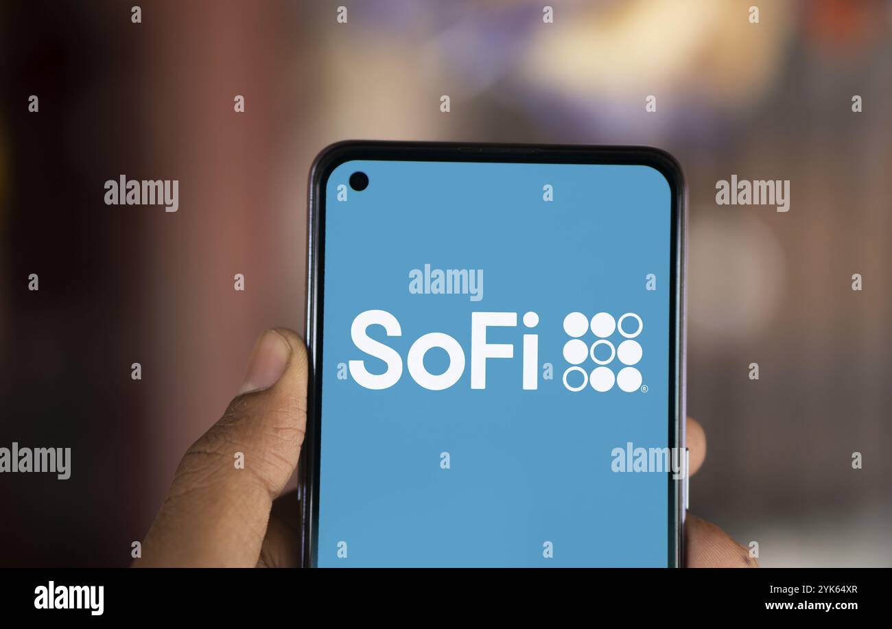 SoFi Technologies logo is displayed on smartphone. SoFi Technologies is ...