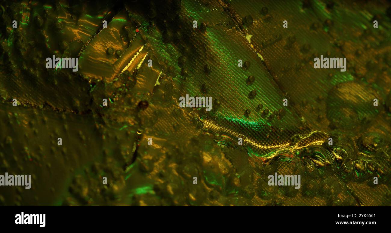 Bokeh background. Bumpy surface. Iridescent overflow on damaged relief ...