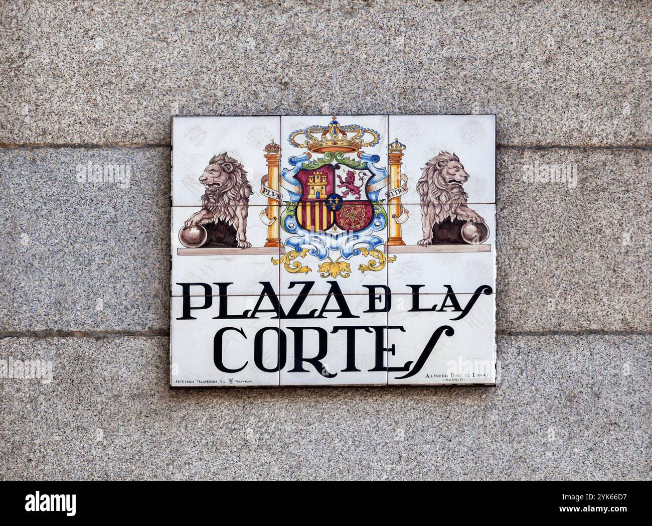A detailed street sign showcases Plaza de las Cortes with decorative ...