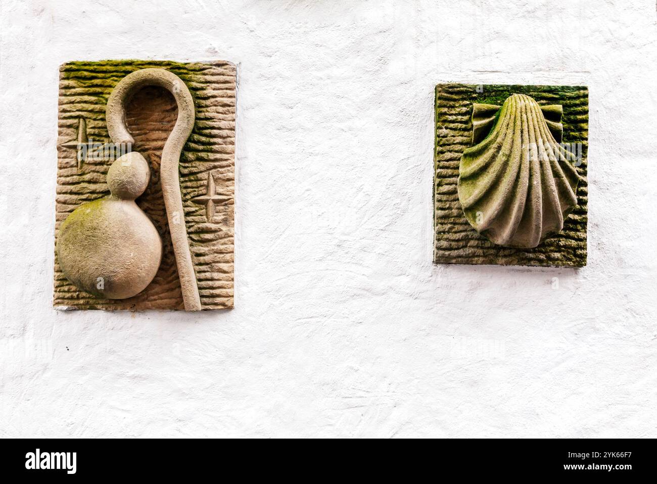 A shell symbol and staff carving representing pilgrimage, are affixed ...