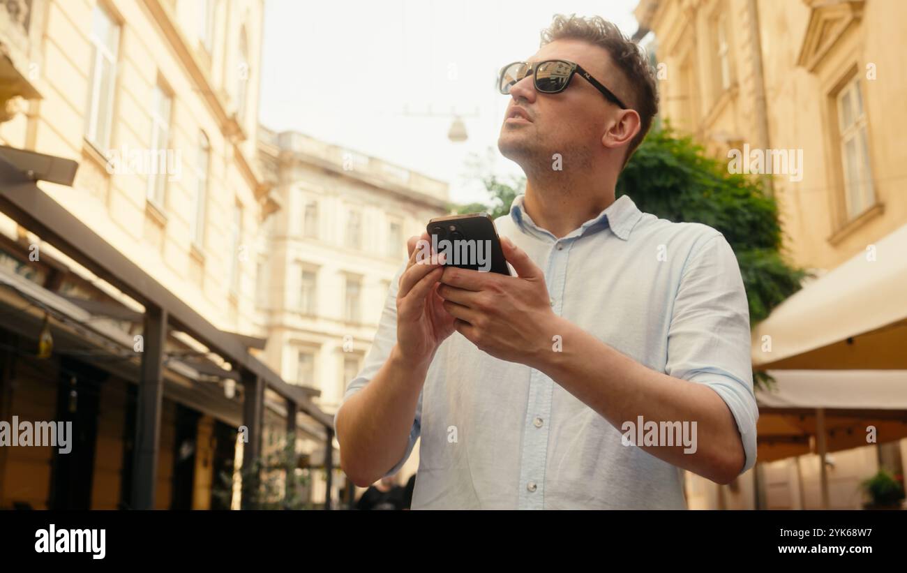Confused man tourist looking address hi-res stock photography and ...