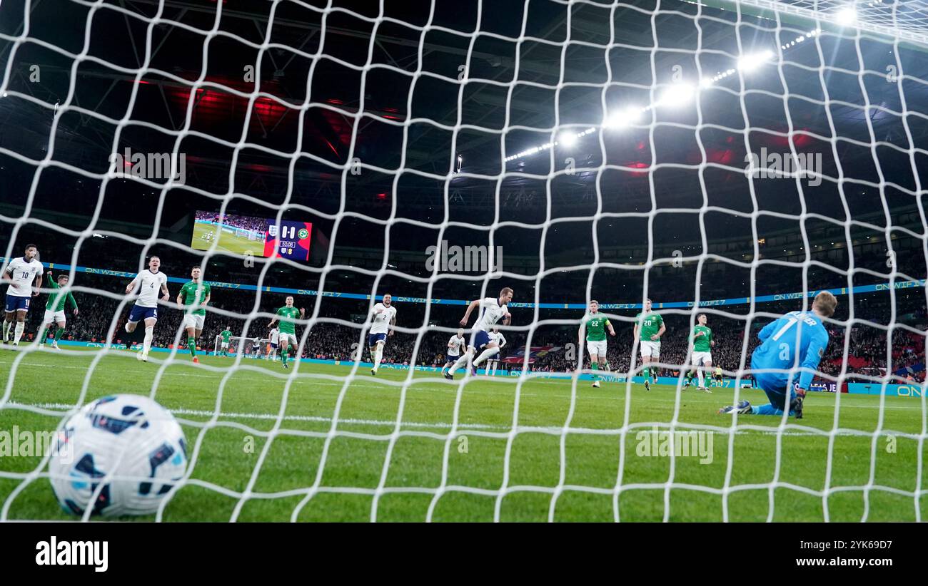 England's Harry Kane scores their side's first goal of the game during ...