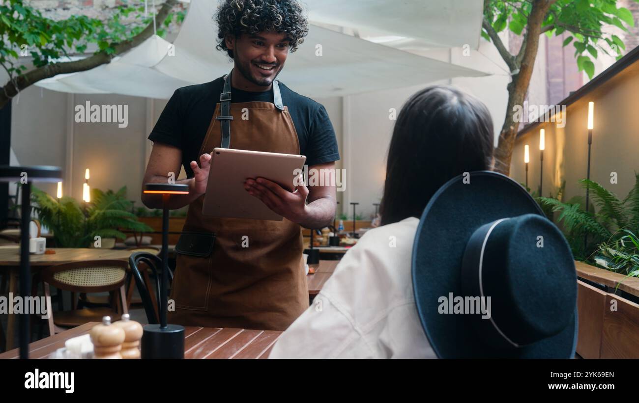 Indian chef serving food in restaurant hi-res stock photography and ...