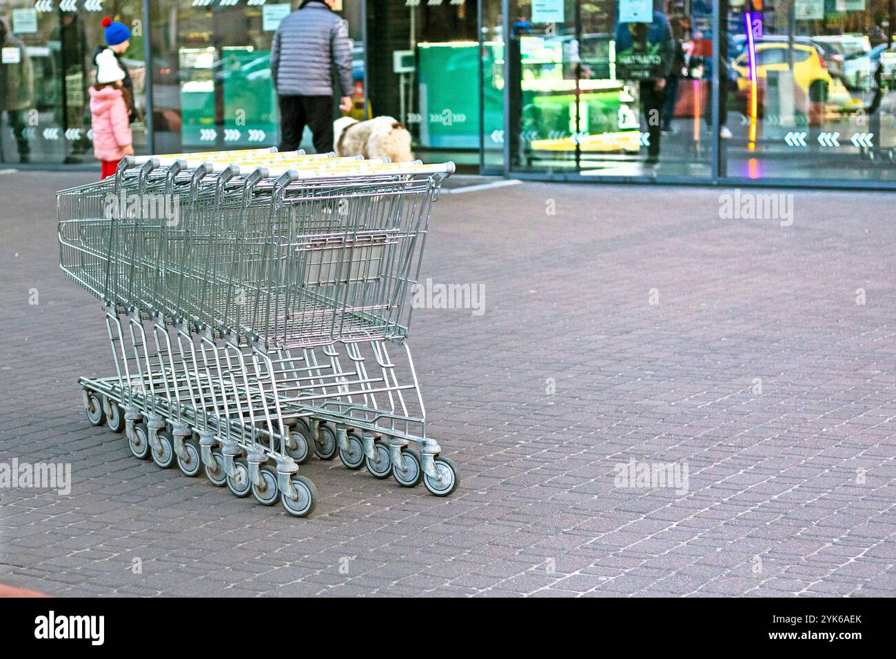 grocery carts near the supermarket next to the car park outside Stock ...