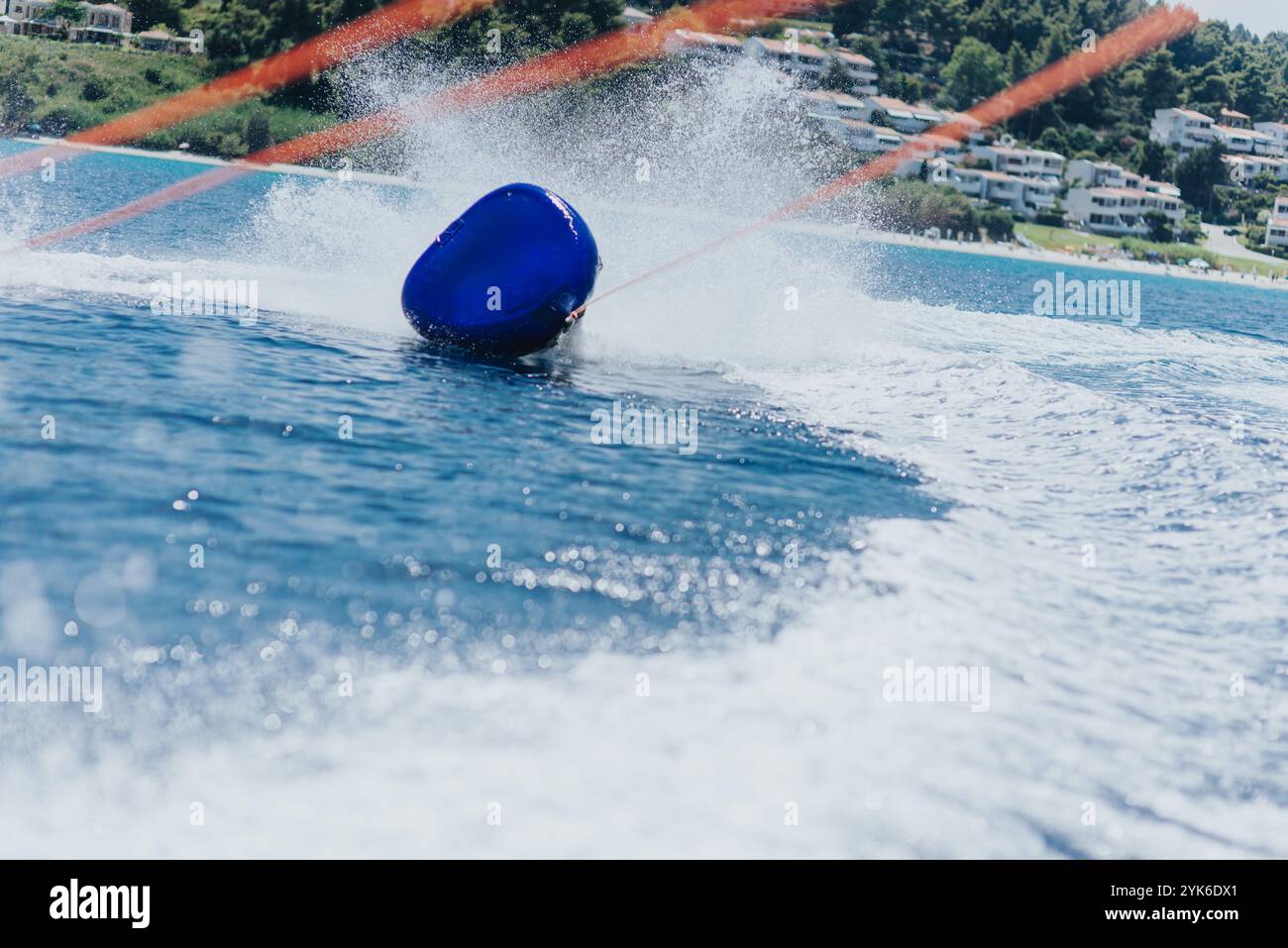 Speed boat tubing adventure with splashing water and vibrant excitement ...