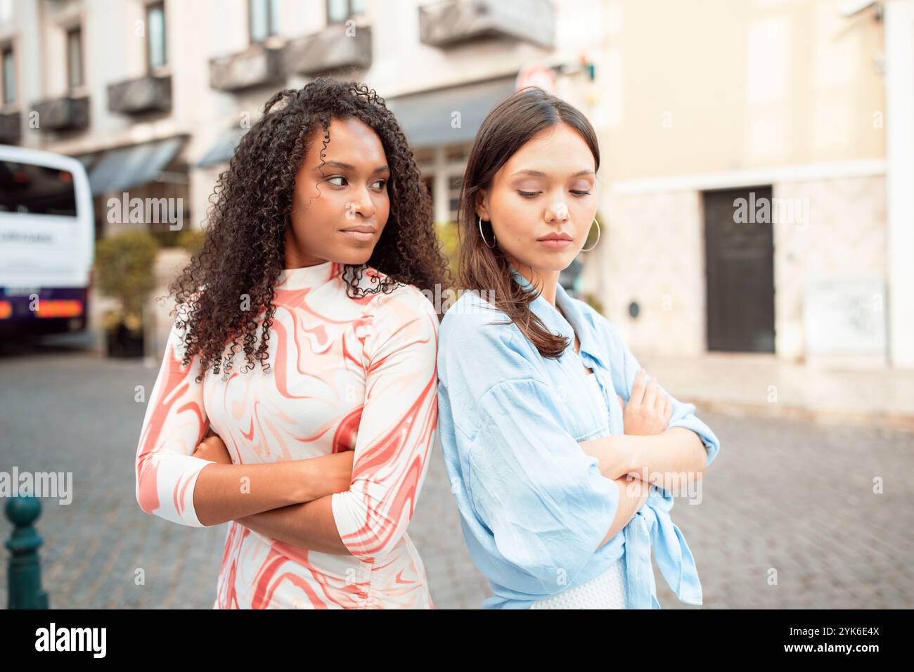Two women standing together hi-res stock photography and images - Alamy