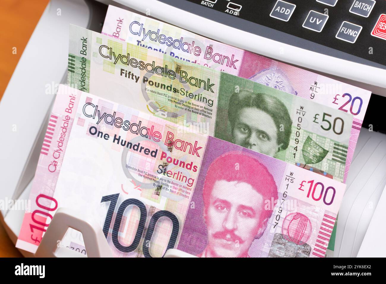 Scottish money - pound in the counting machine Stock Photo - Alamy