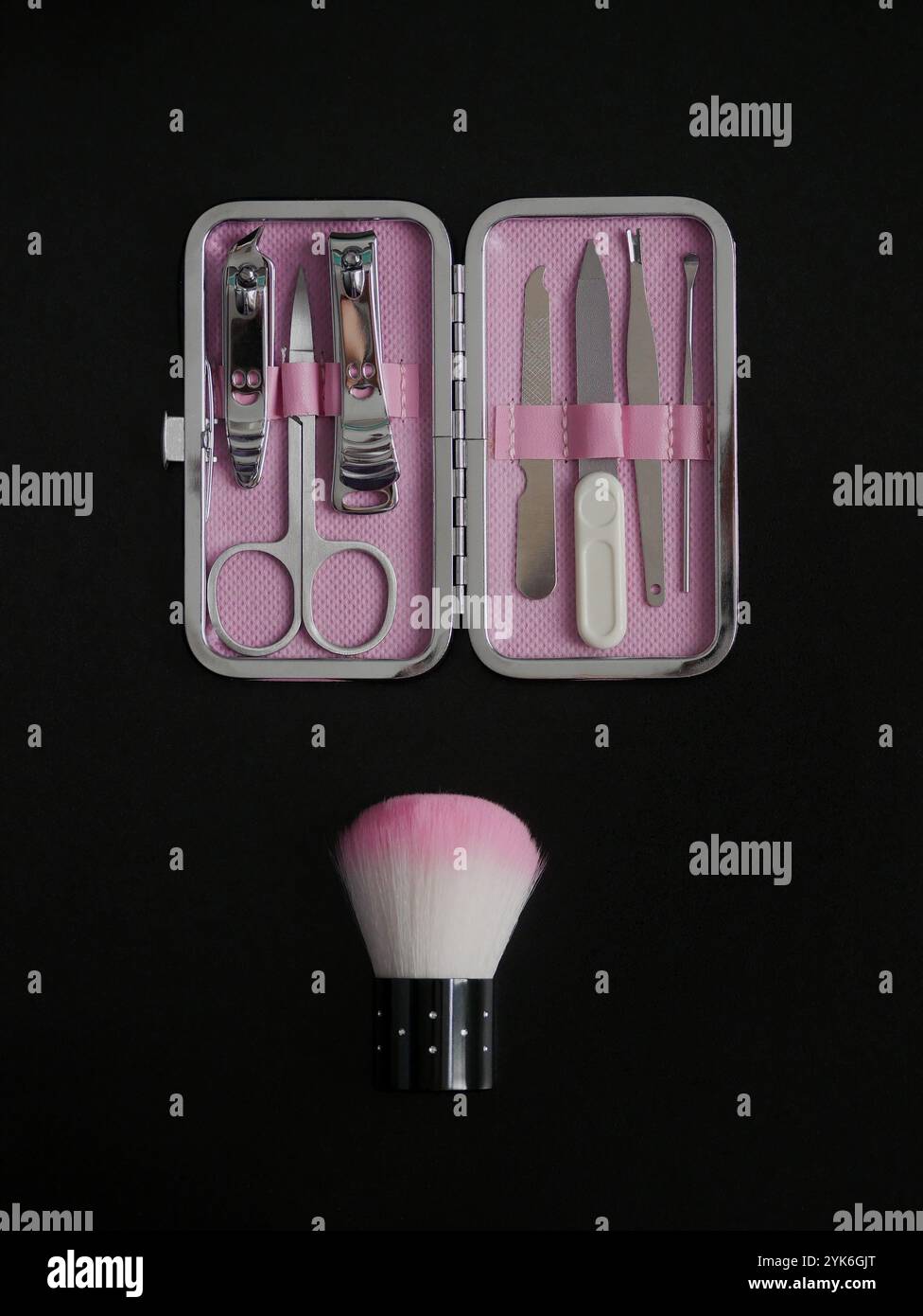 Pink manicure set isolated on black background with copy space Stock ...