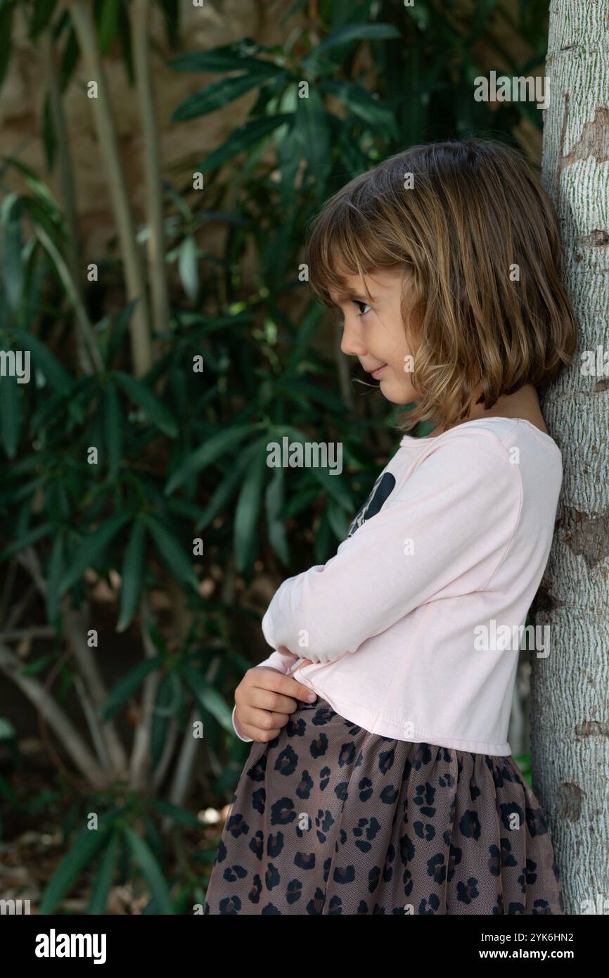 girl with suspicious look Stock Photo - Alamy