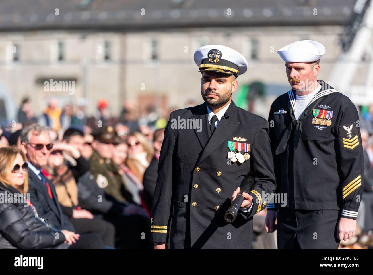 Lt. Steven Lewis (Officer of the Deck) carrying the ceremonial ...