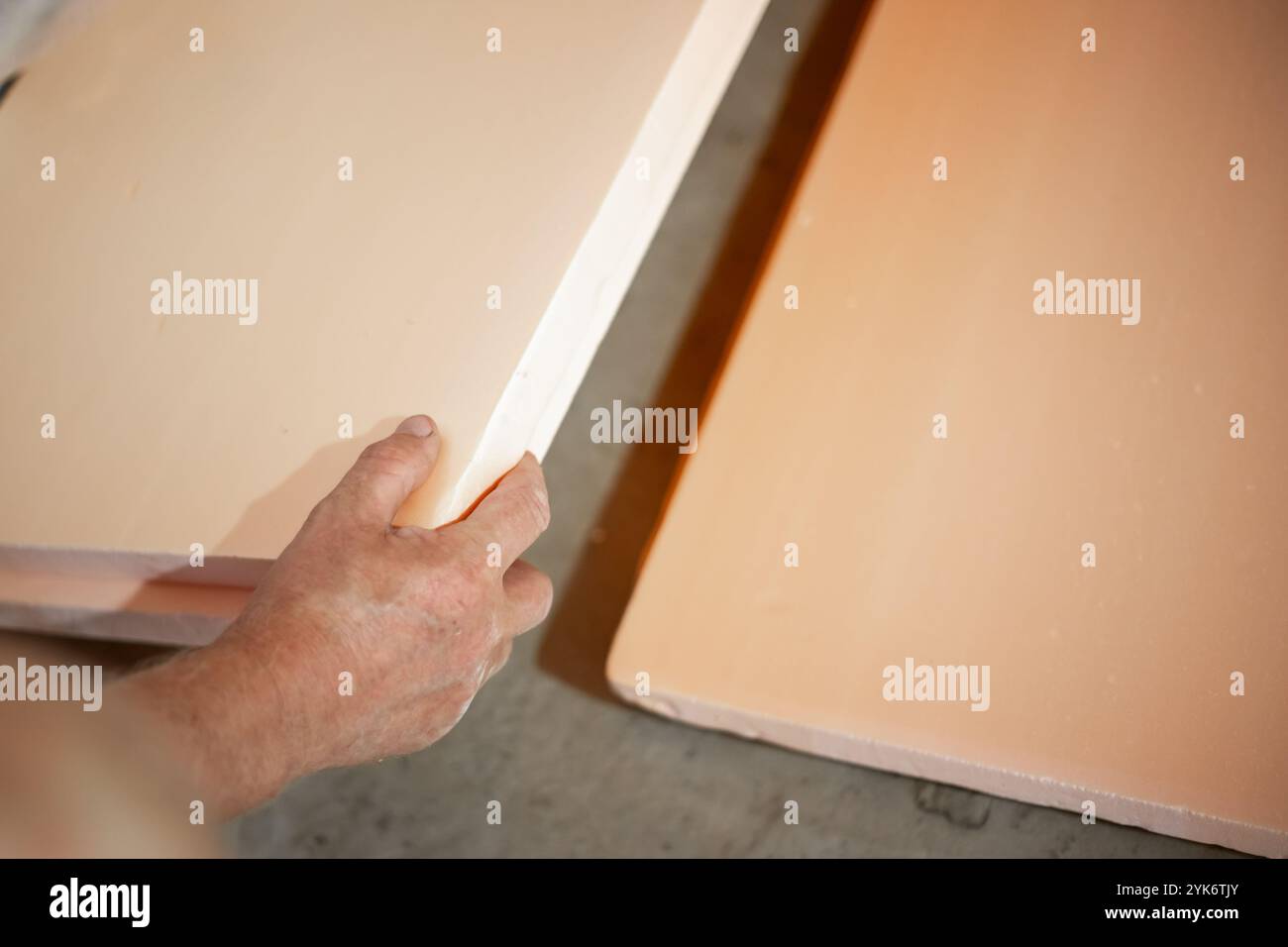 Laying polystyrene foam on the floor. Thermal insulation of the floor ...