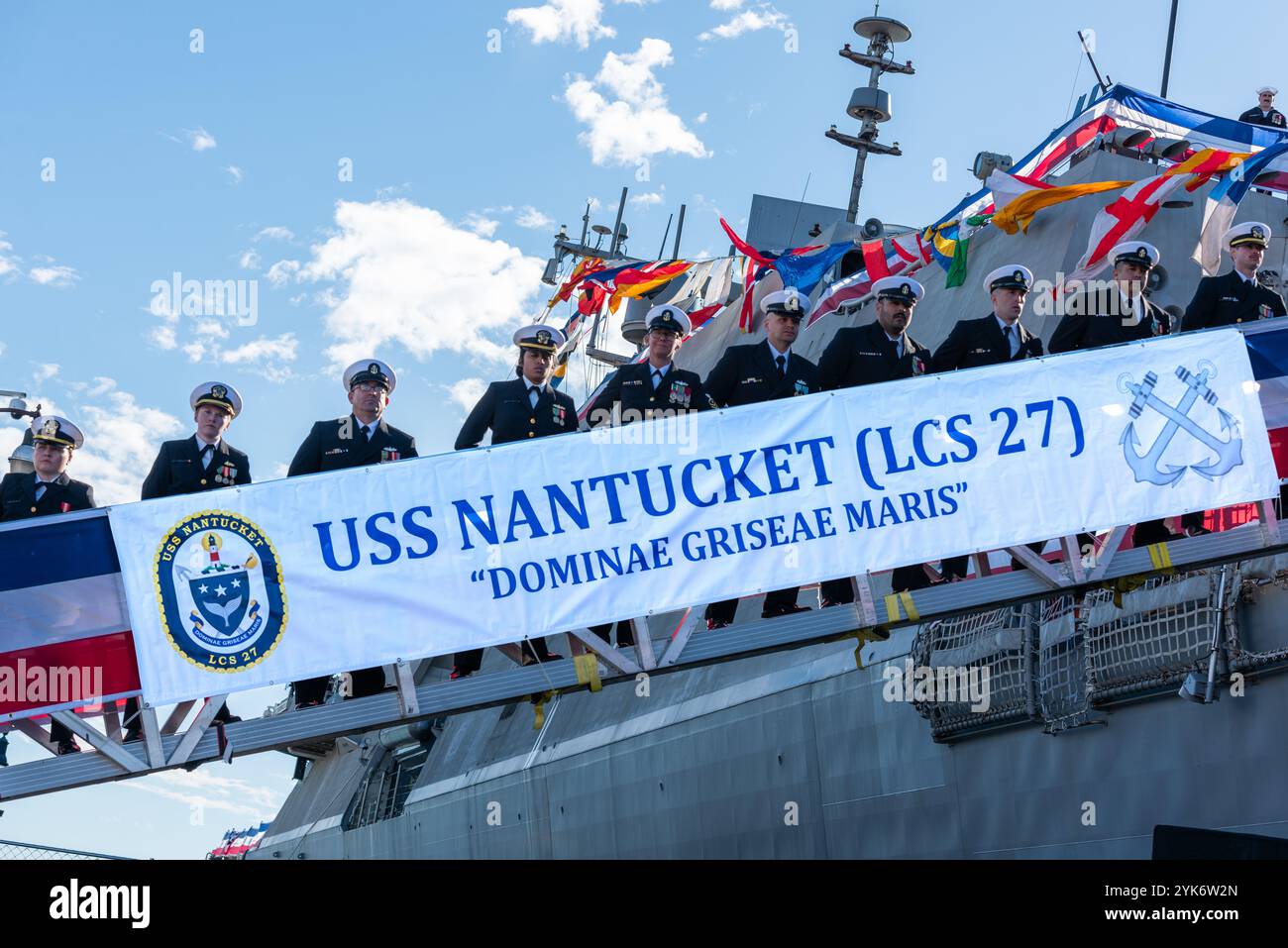 The crew of the USS Nantucket (LCS 27) stands in formation on the ...