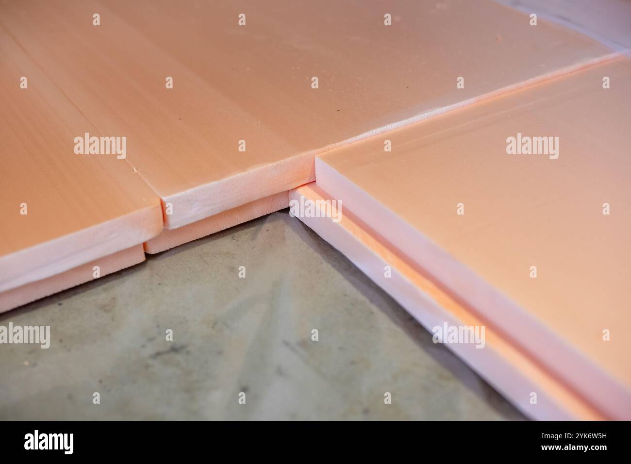 Laying polystyrene foam on the floor. Thermal insulation of the floor ...