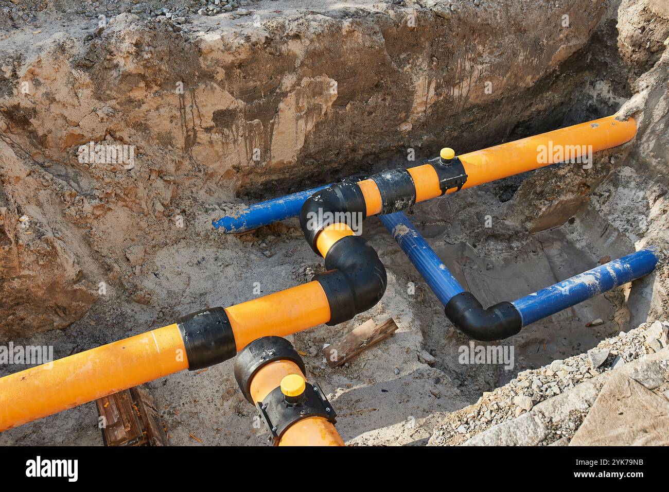 Construction site utility pipes hole Stock Photo - Alamy