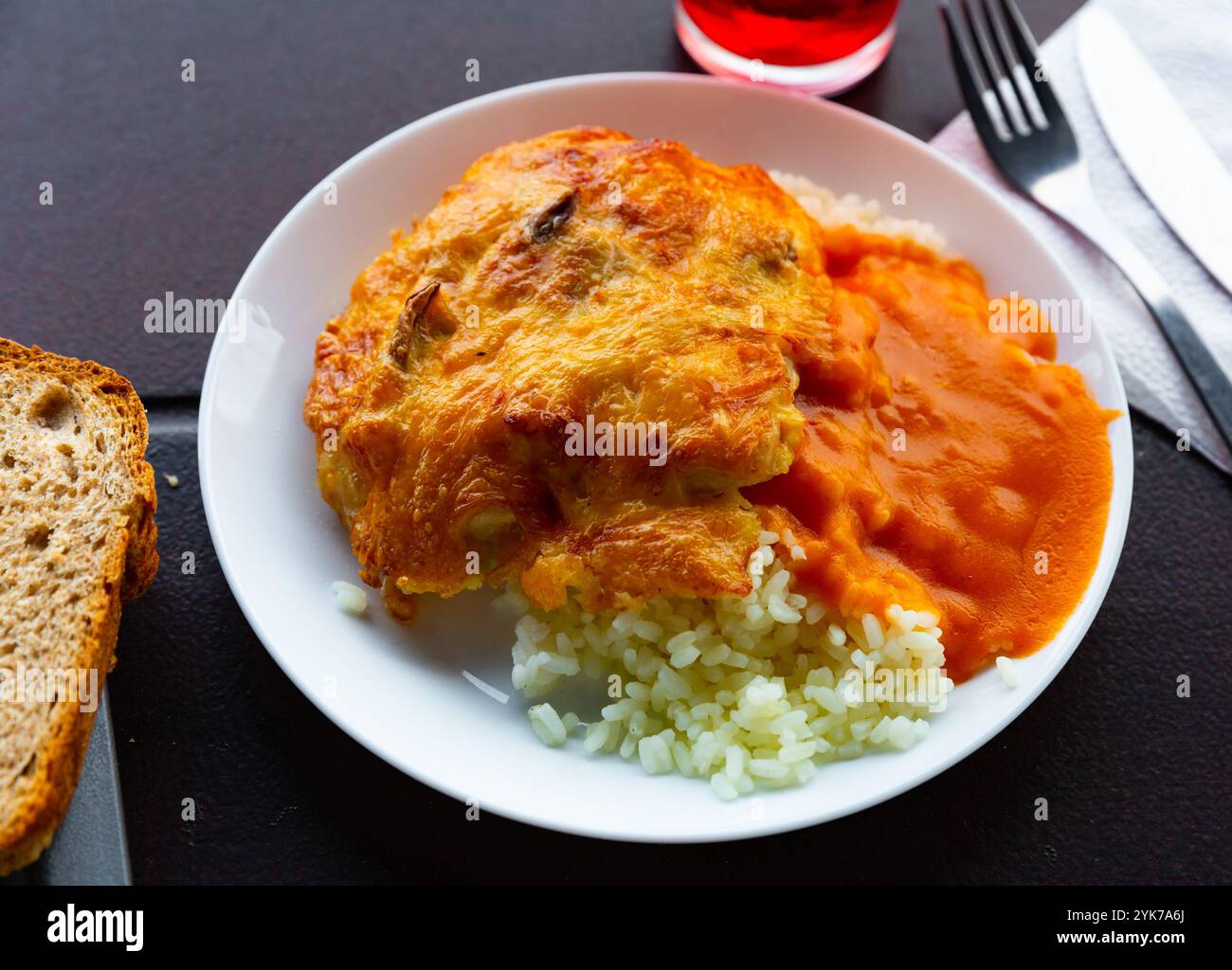 Baked chicken fillet with mushrooms and rice. Russian cuisine Stock ...